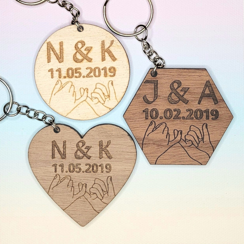 CUSTOM WOOD ENGRAVED KEYCHAINS AND SIGNS