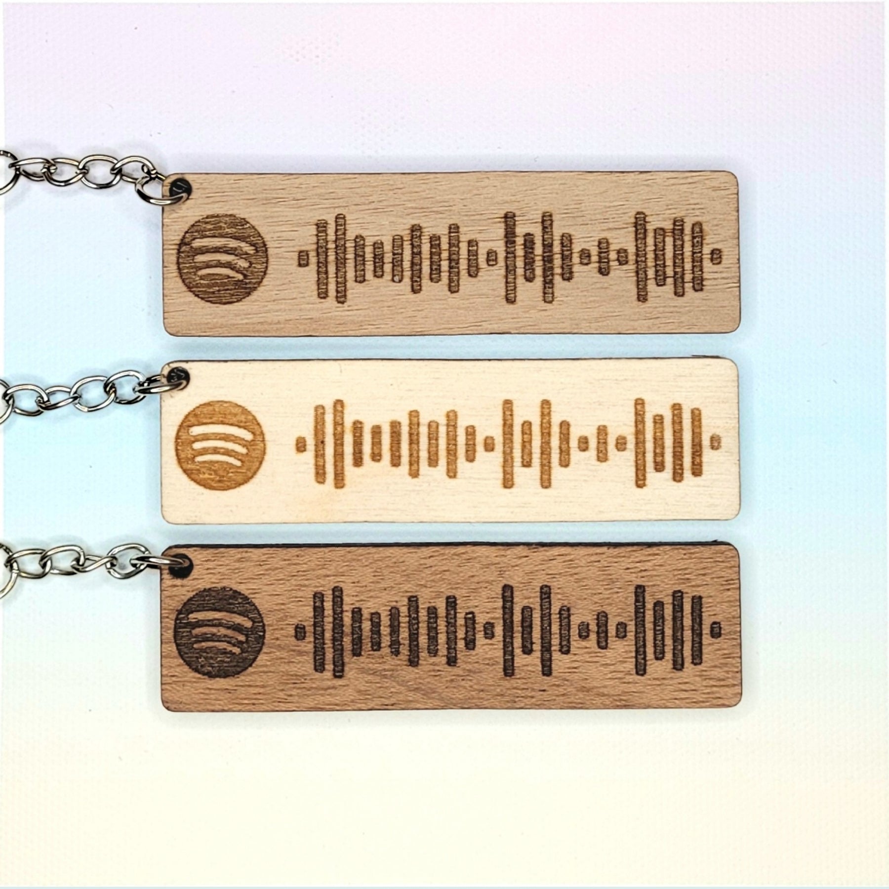 CUSTOM WOOD ENGRAVED KEYCHAINS AND SIGNS